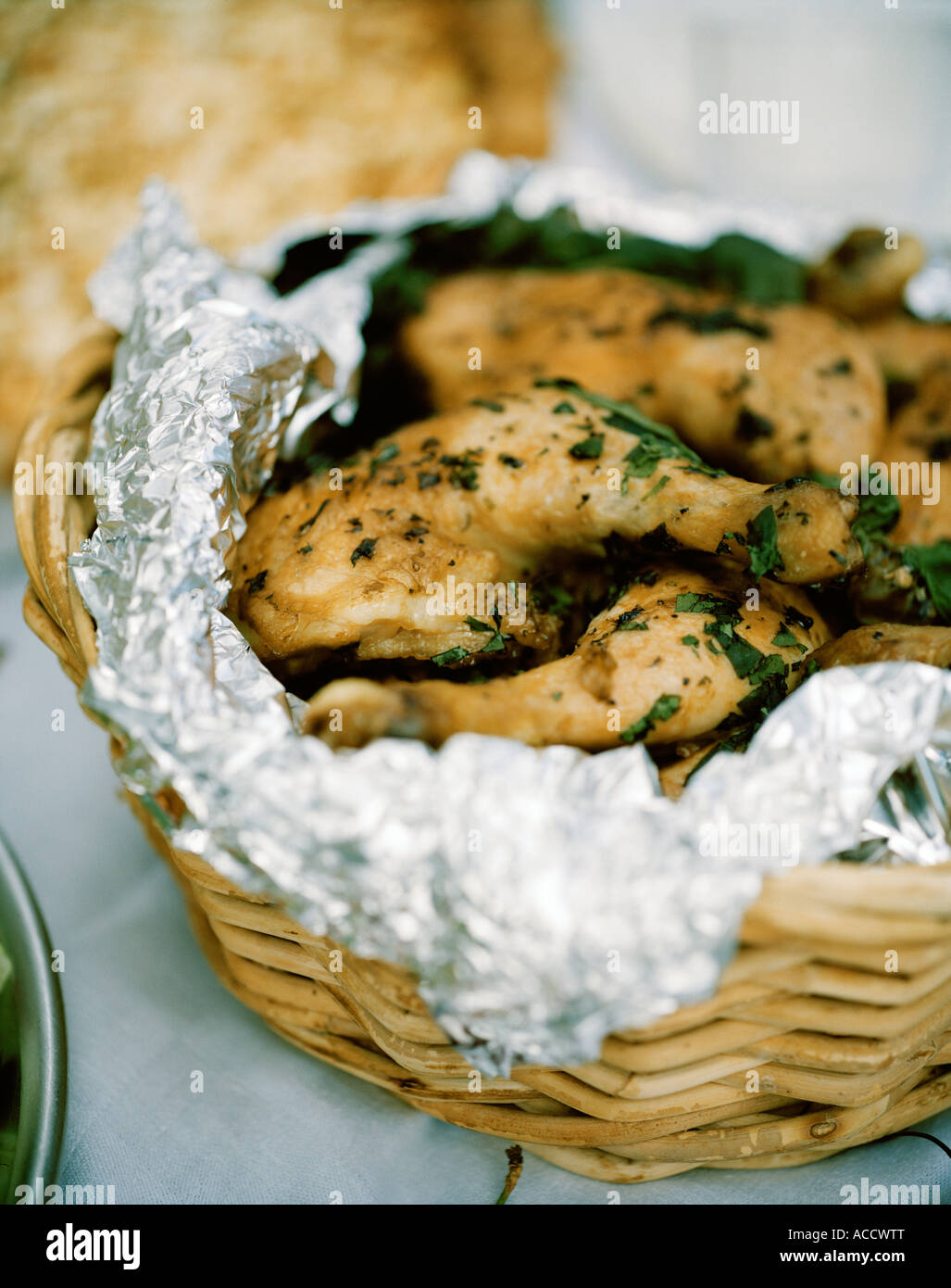 Grilled chicken in a basket Stock Photo - Alamy