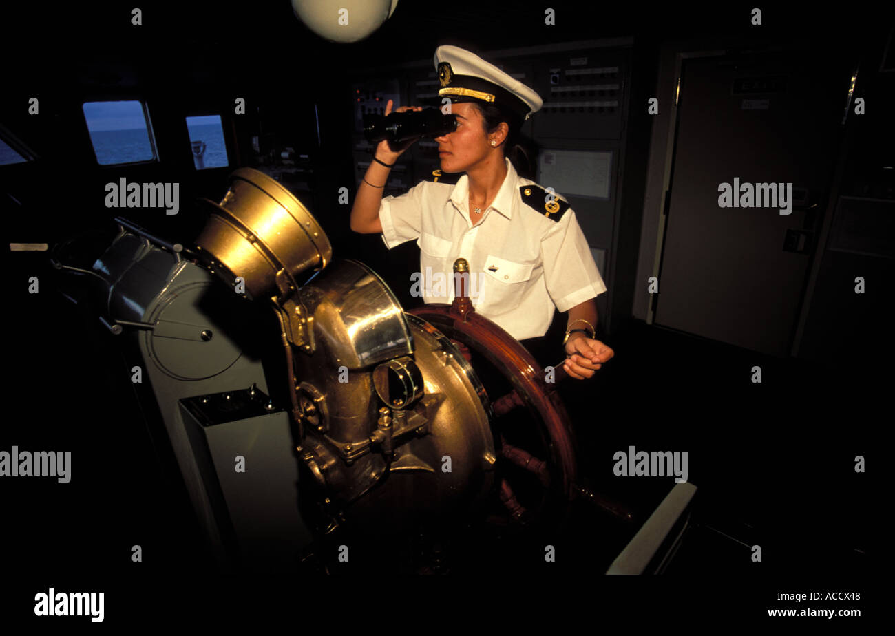 second chief on cruiseship helmsman is a woman Stock Photo - Alamy