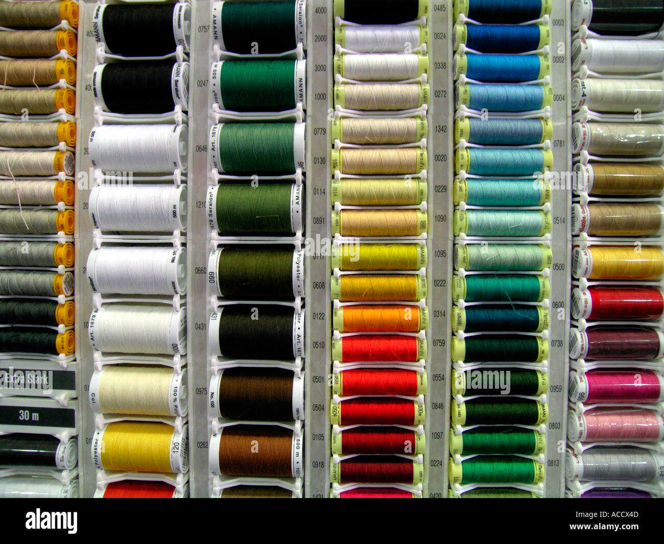 coloured sewing thread Stock Photo - Alamy