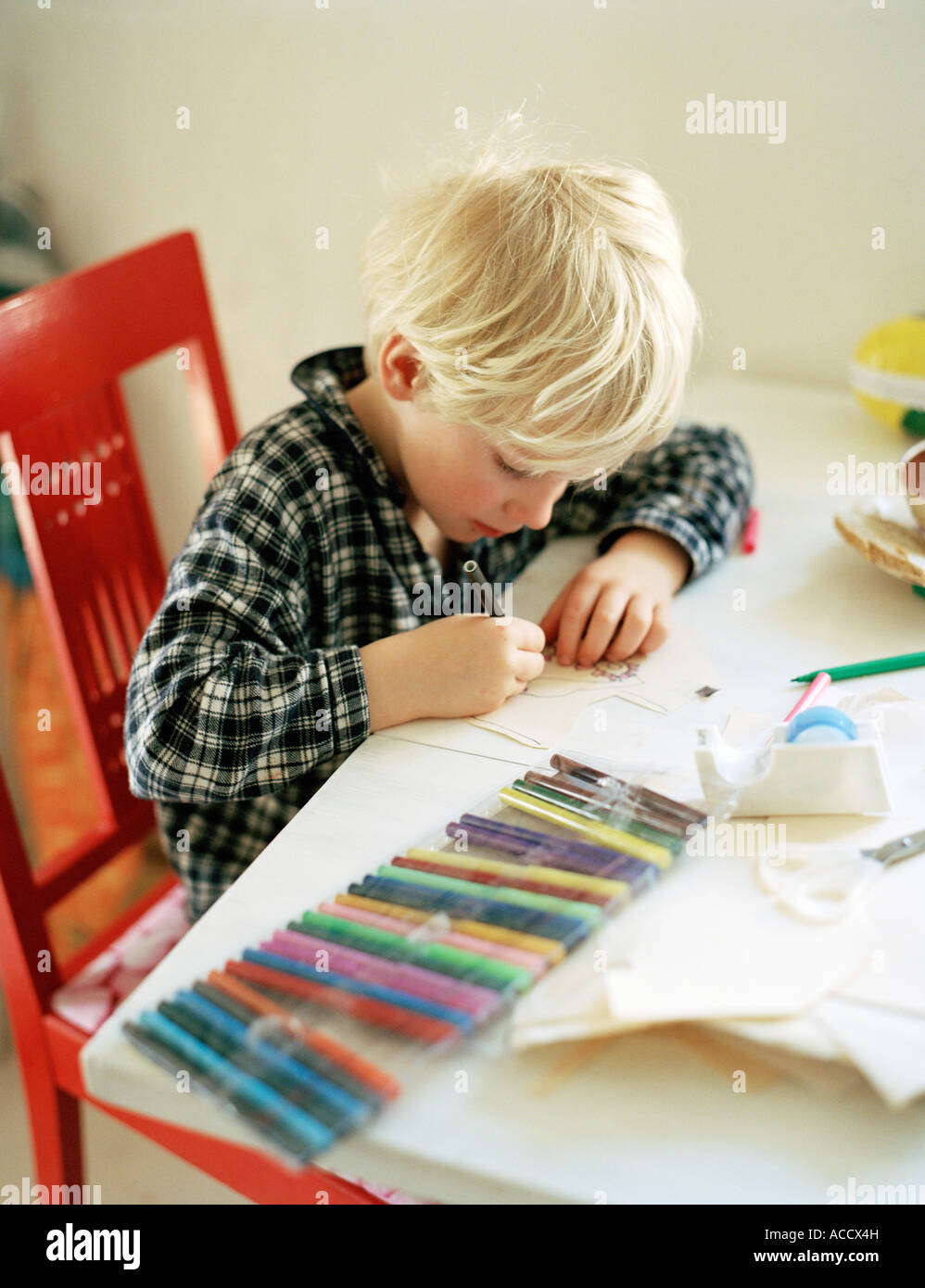 A boy drawing Stock Photo - Alamy
