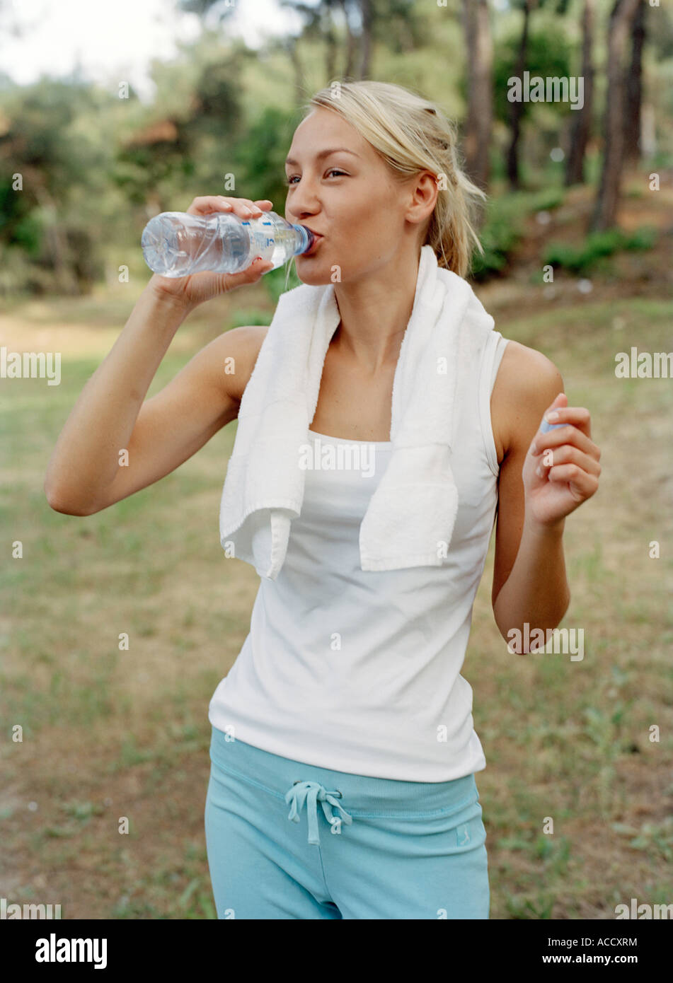 A woman drinking water Stock Photo - Alamy