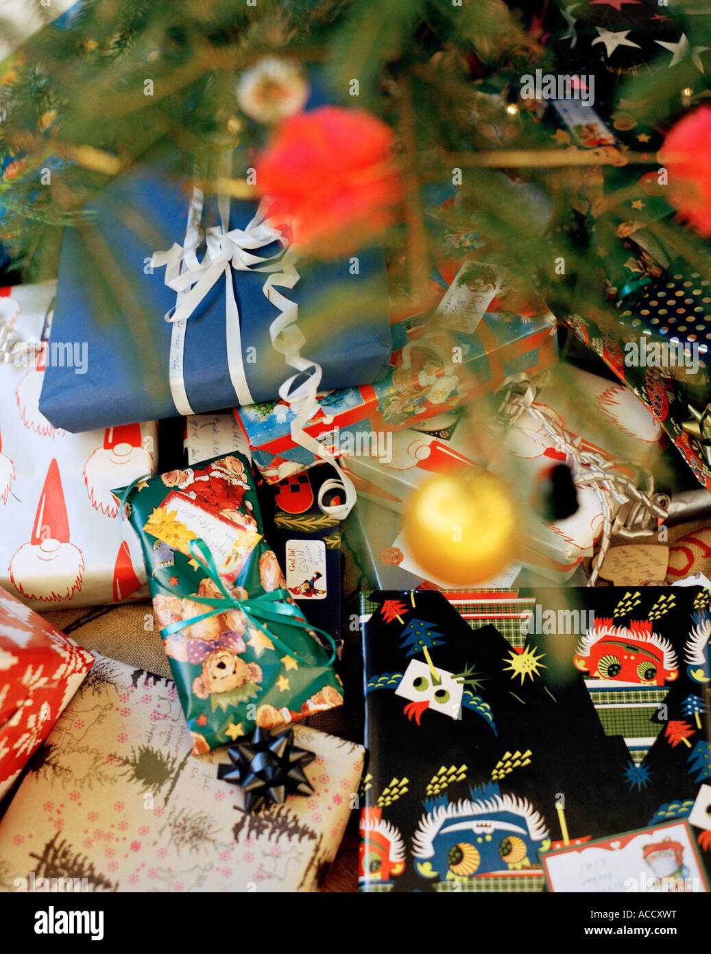 Presents under a christmas tree hi-res stock photography and images - Alamy