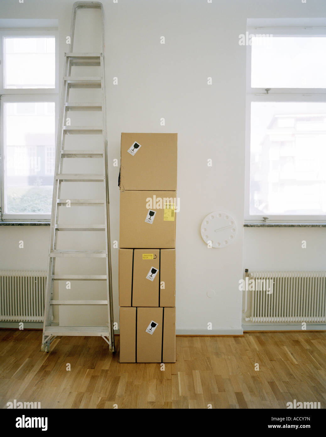 Moving boxes in an apartment Stock Photo - Alamy