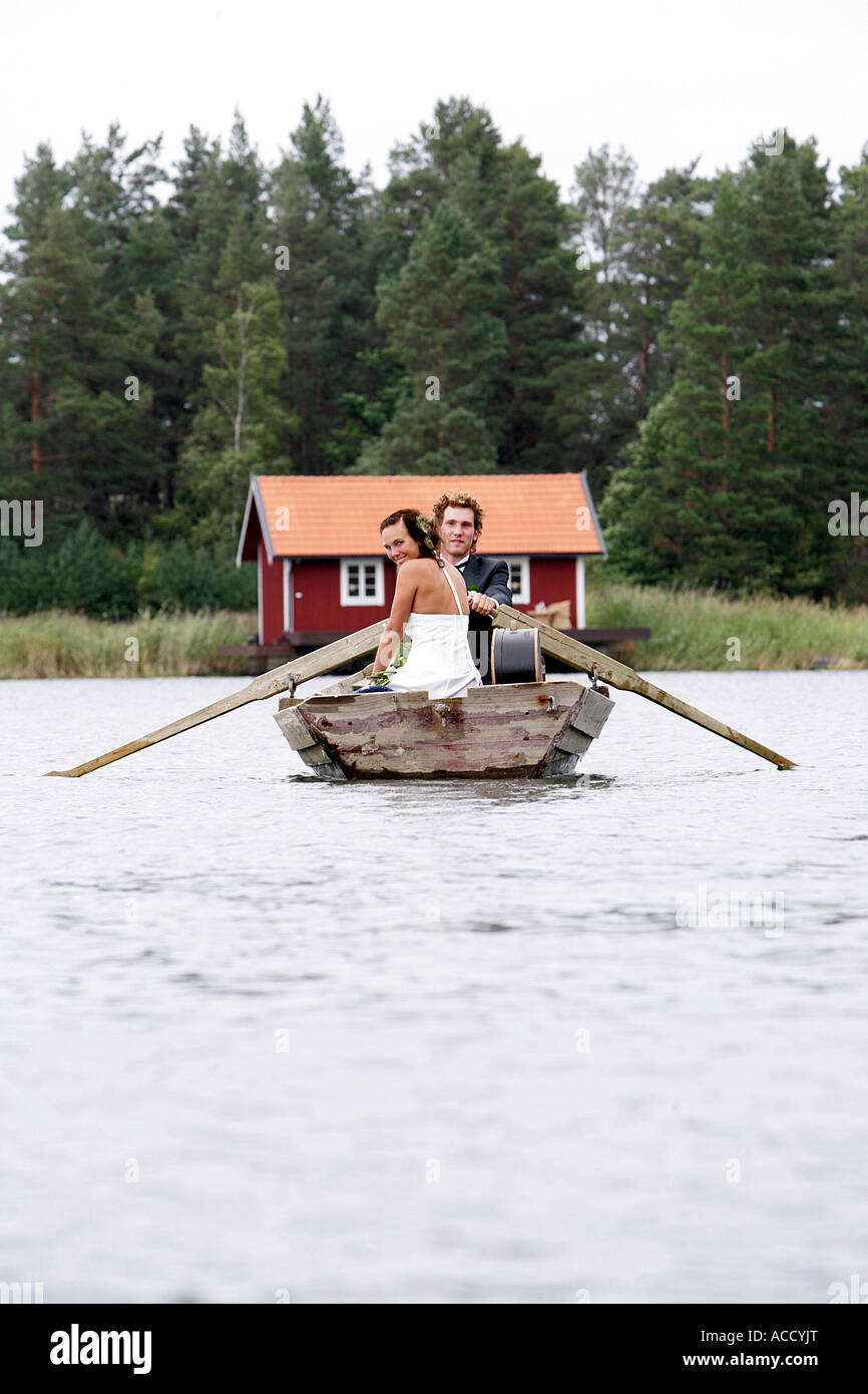 Man woman rowing boat hi-res stock photography and images - Alamy