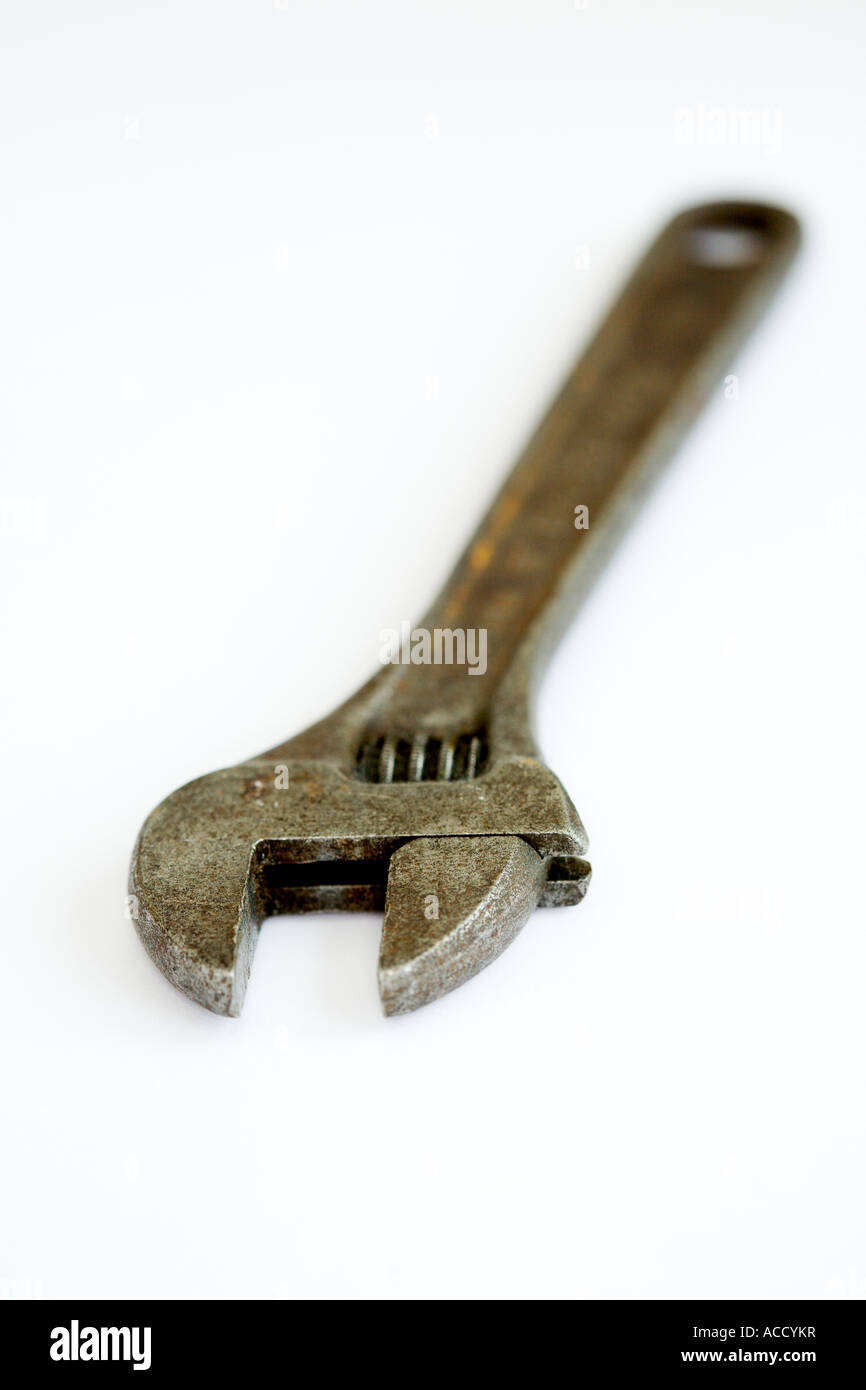 Rusty old adjustable spanner wrench Stock Photo - Alamy