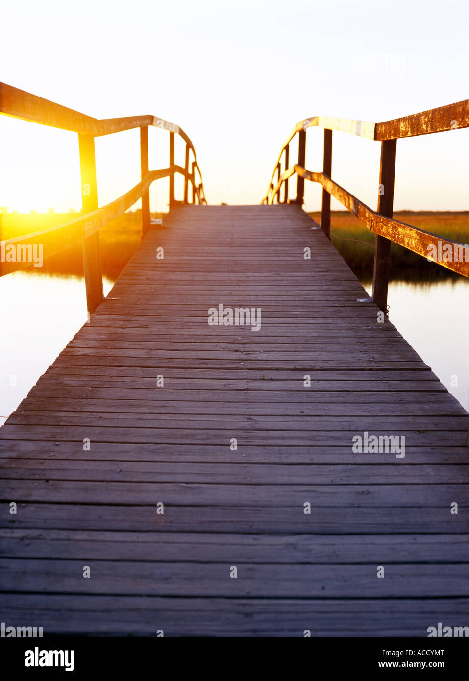 A bridge over calm water Stock Photo - Alamy