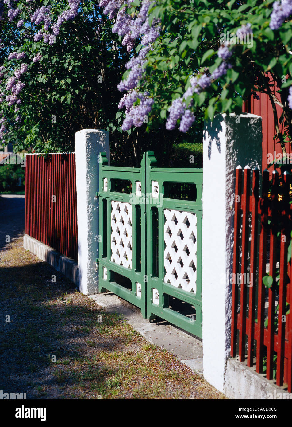 A gate in front of a house Stock Photo - Alamy