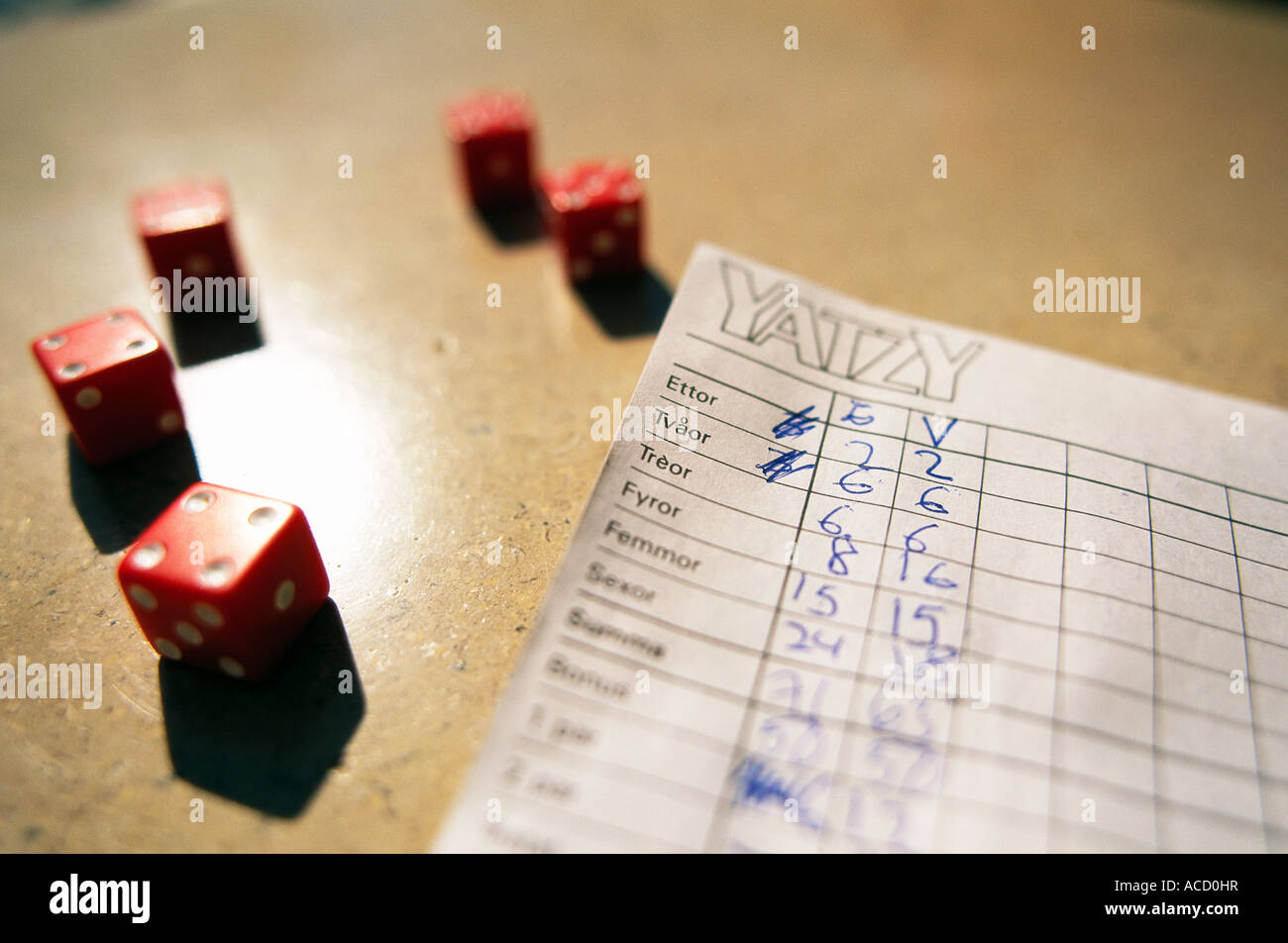 Dice and a game of yatzy Stock Photo - Alamy