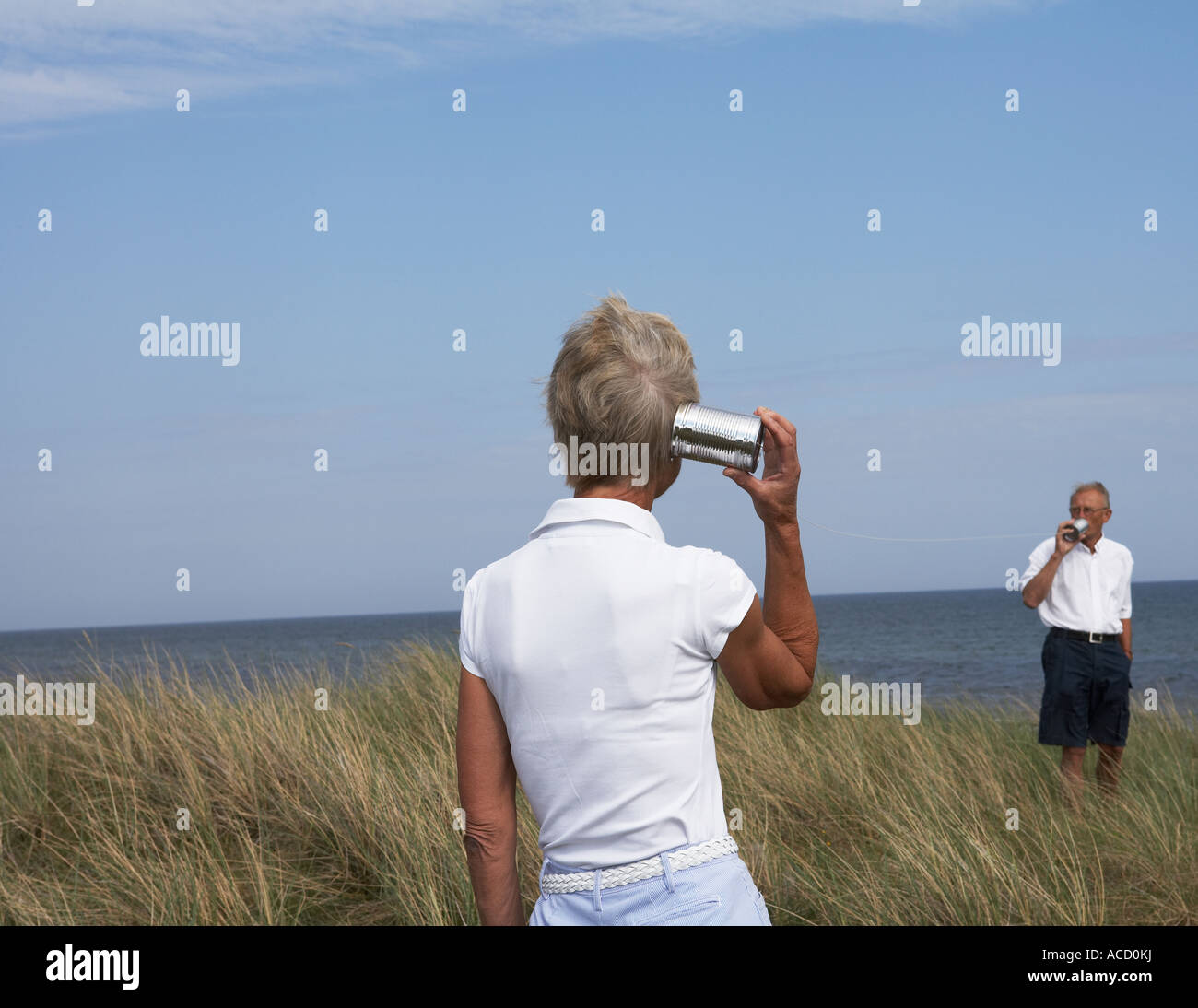 Talking with cans hi-res stock photography and images - Alamy