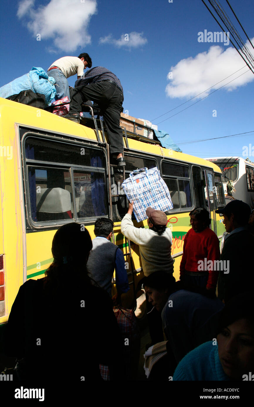 Street scene, people loading bus at Uyuni bus station, Argentina Stock ...