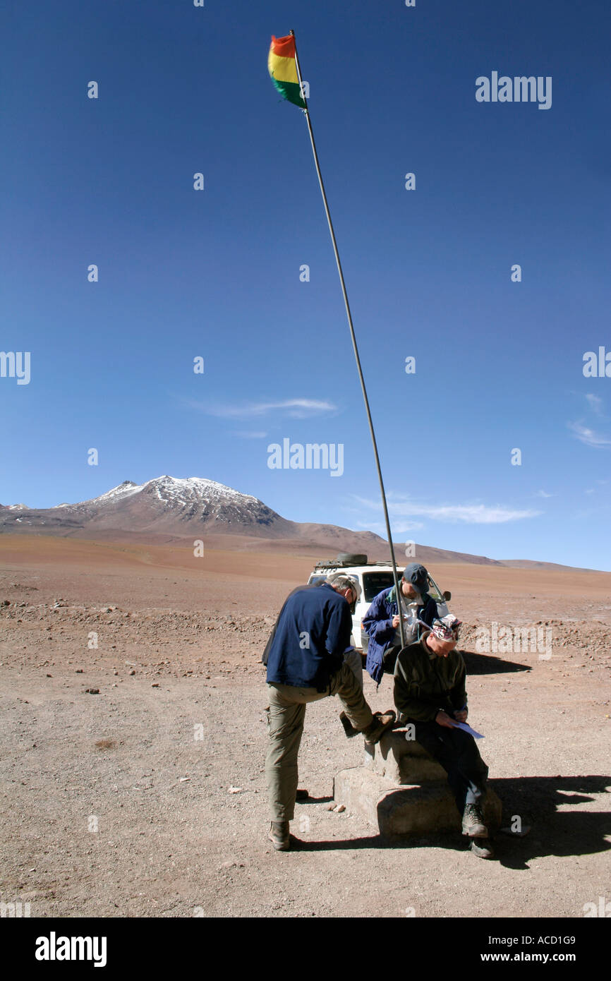 Tourist filling immigration cards at border between Bolivia and Peru ...