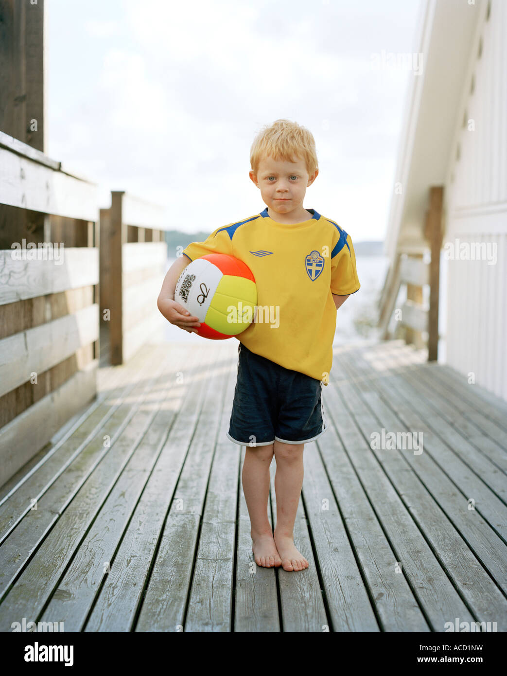Portrait of a boy with a ball Stock Photo - Alamy