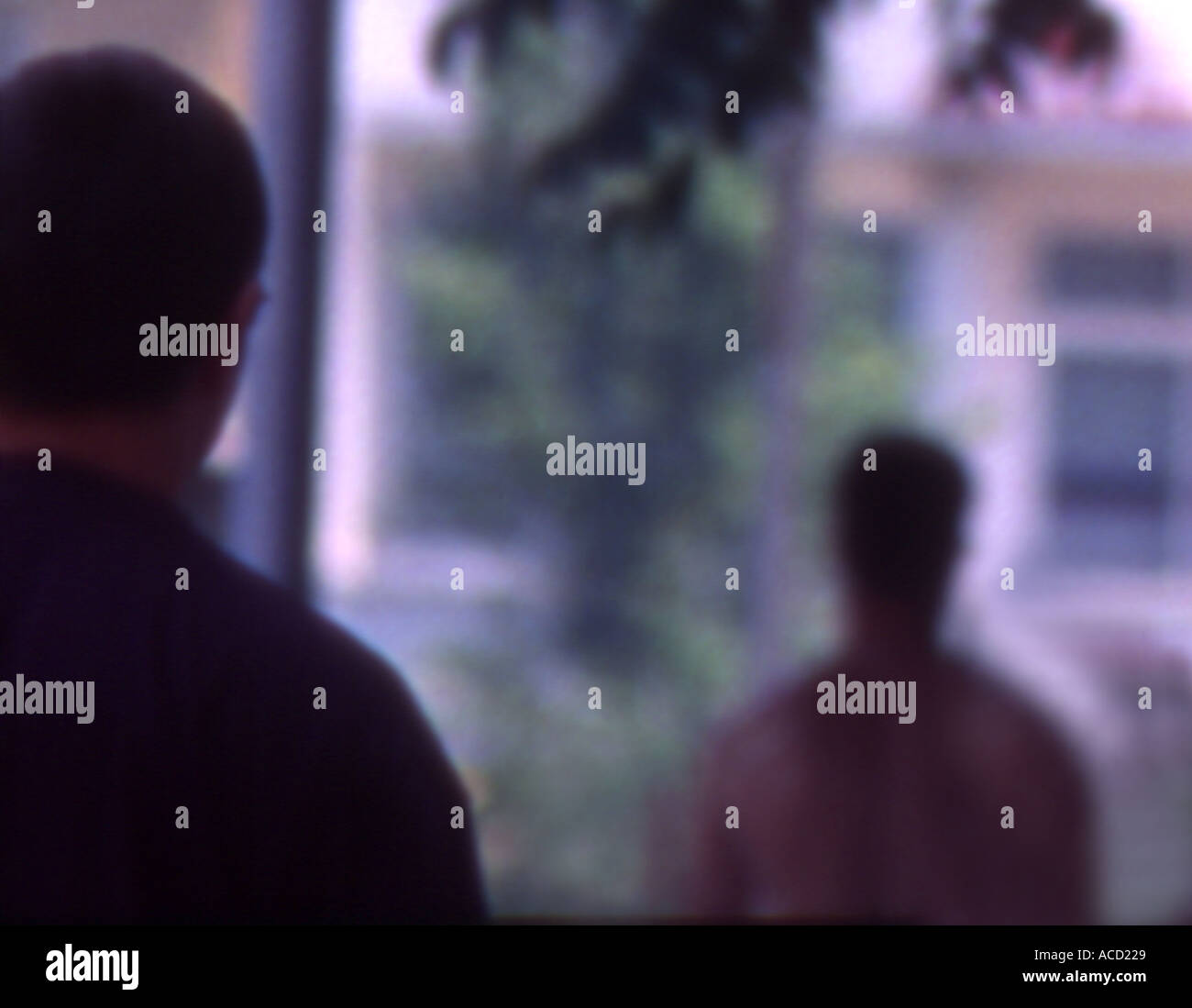 Menacing shot of two people on following Stock Photo - Alamy