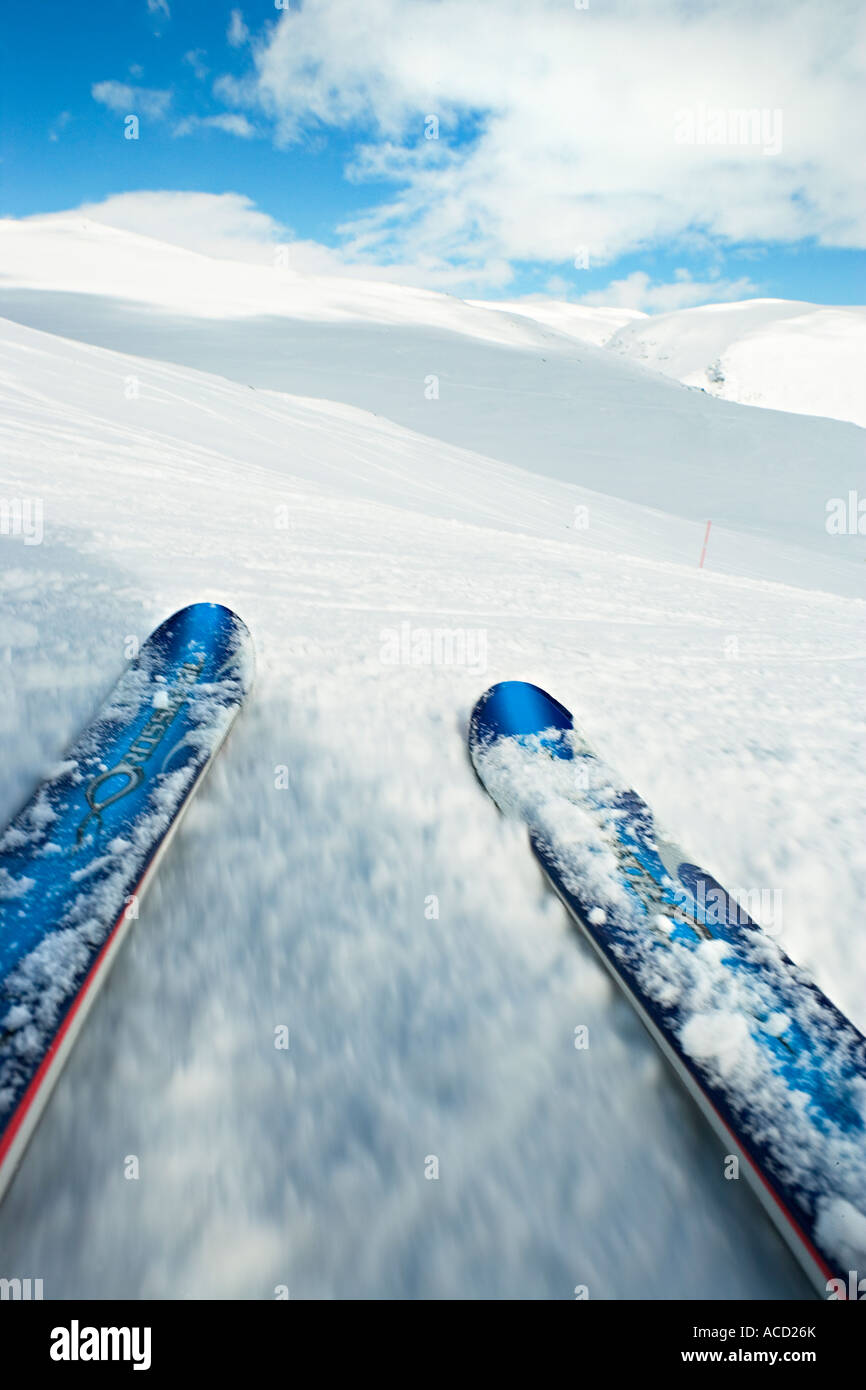 Slalom skis in a ski slope Stock Photo - Alamy