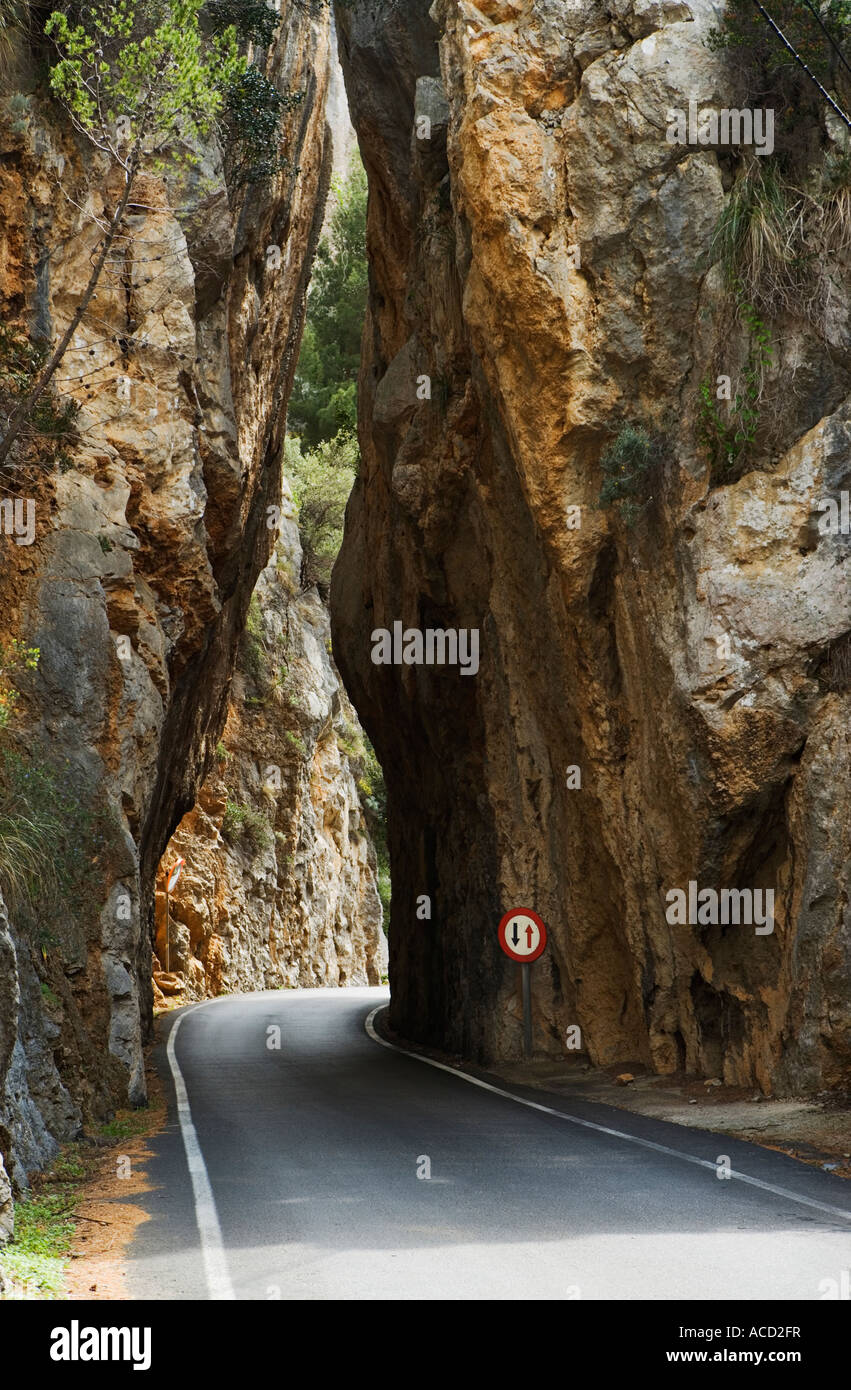 A road by a mountain cleft Stock Photo - Alamy