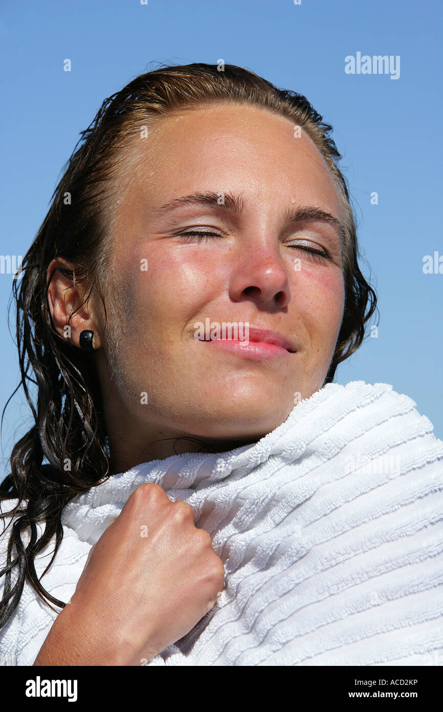 A woman drying in the sun Stock Photo - Alamy