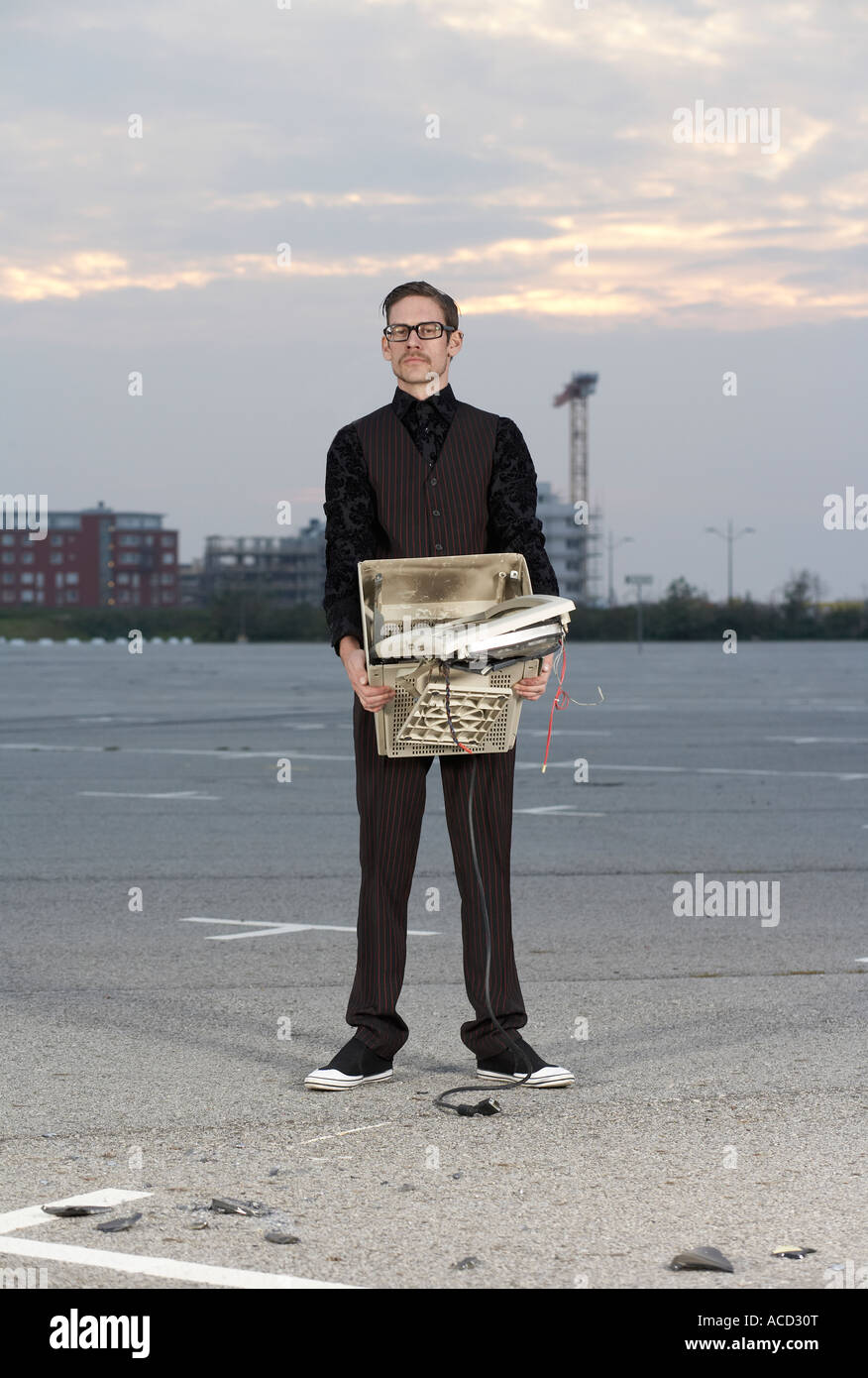 A man with a broken computer Stock Photo - Alamy