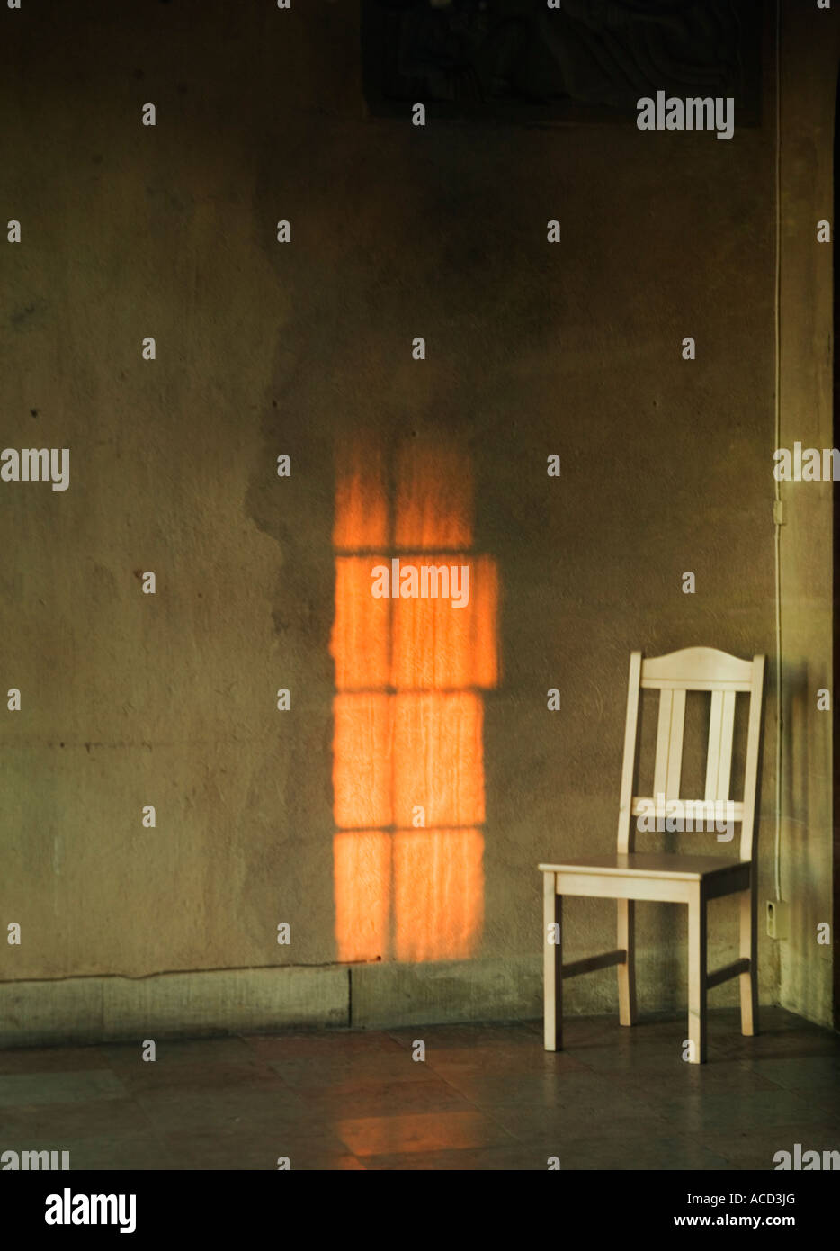 A chair in an empty room Stock Photo - Alamy