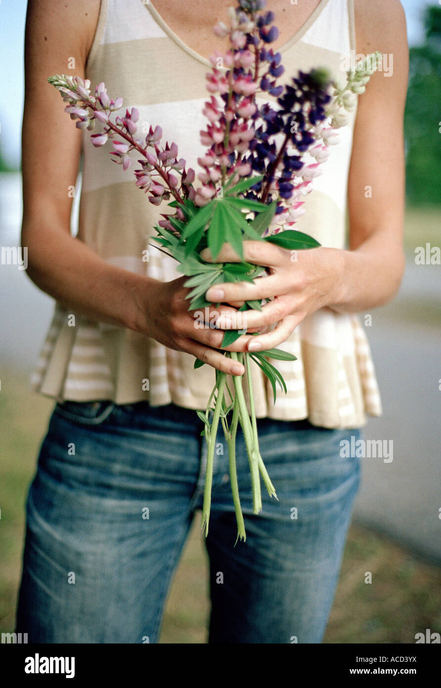 Carrying vertical woman hi-res stock photography and images - Alamy