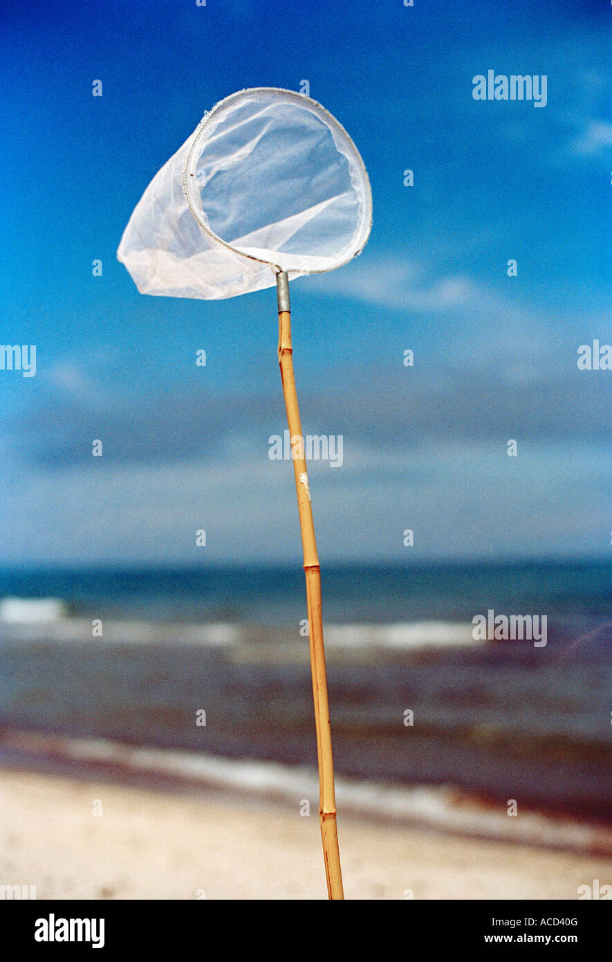 A landing net on a beach Stock Photo - Alamy