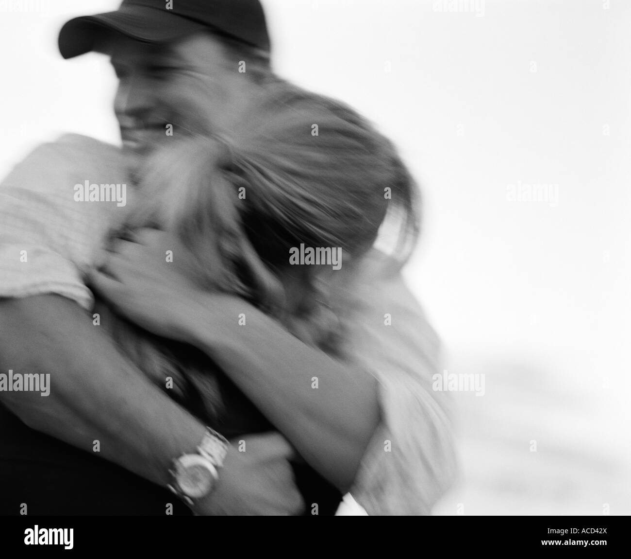 A couple hugging Stock Photo - Alamy
