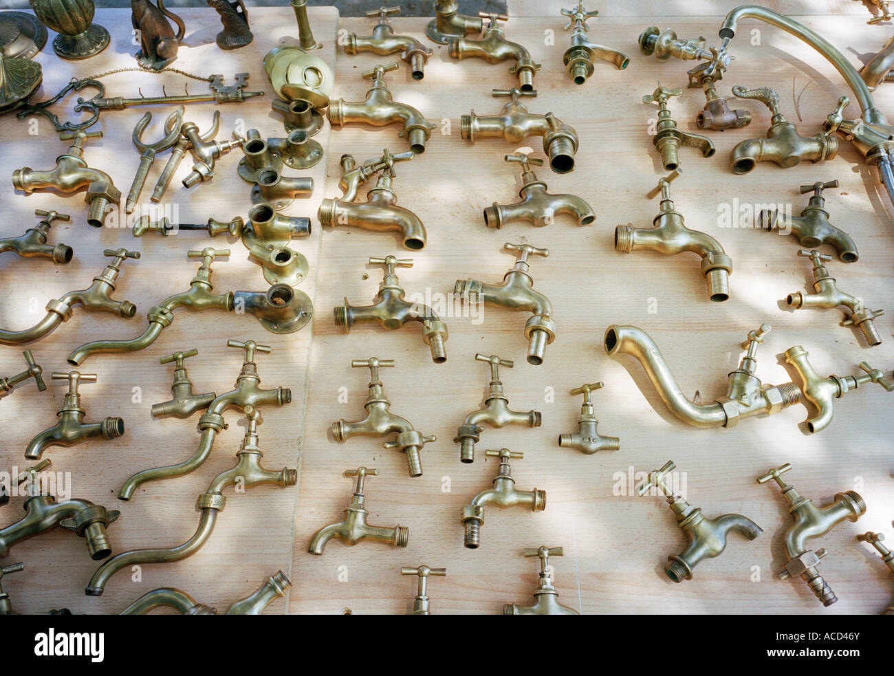 Water taps in copper Stock Photo - Alamy