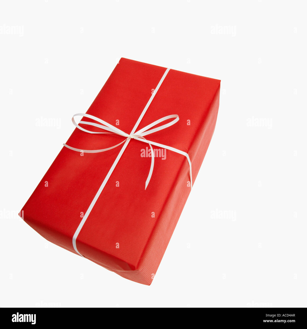 A Christmas present on a white background Stock Photo - Alamy
