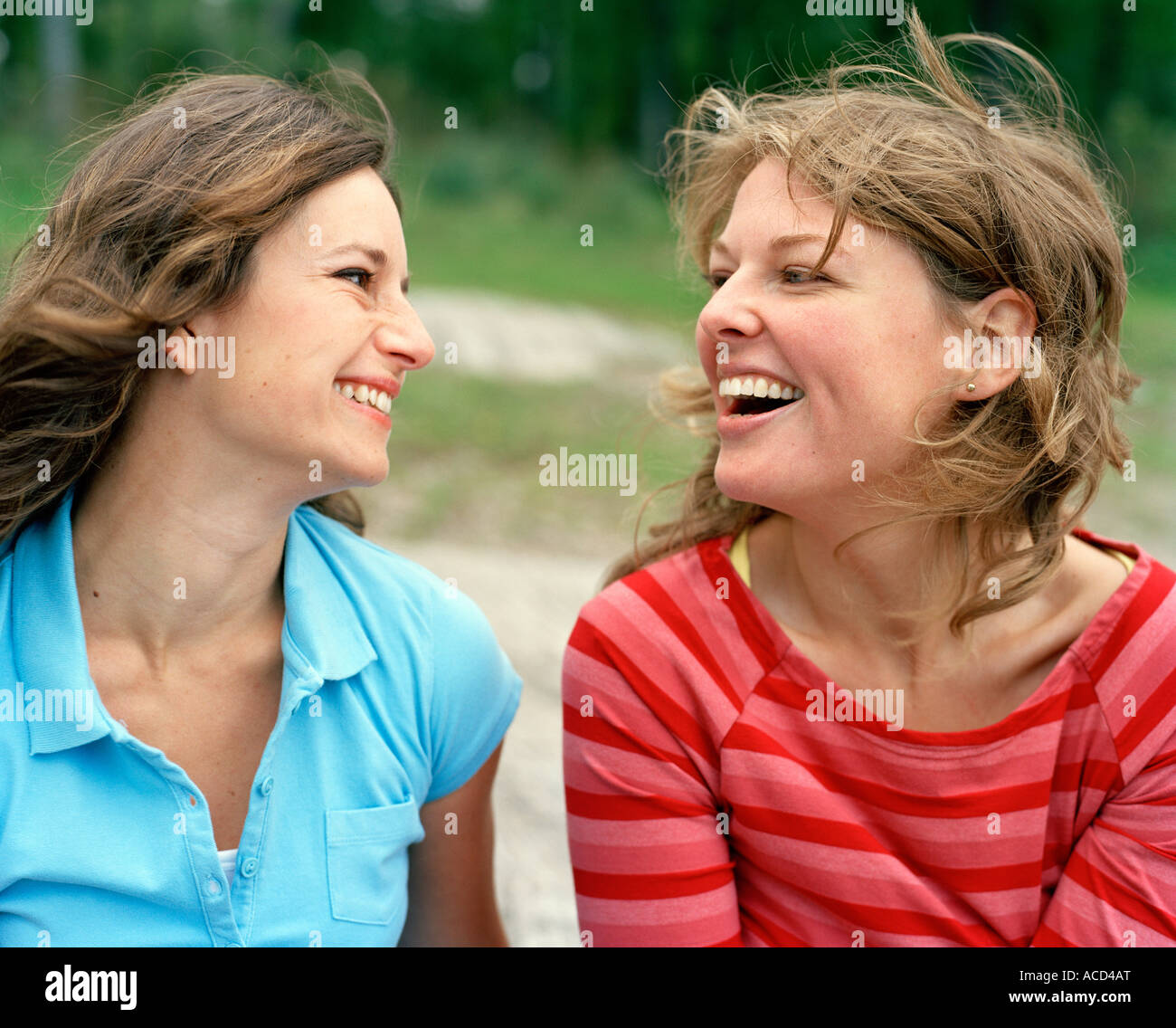 Two happy friends outdoors Stock Photo - Alamy