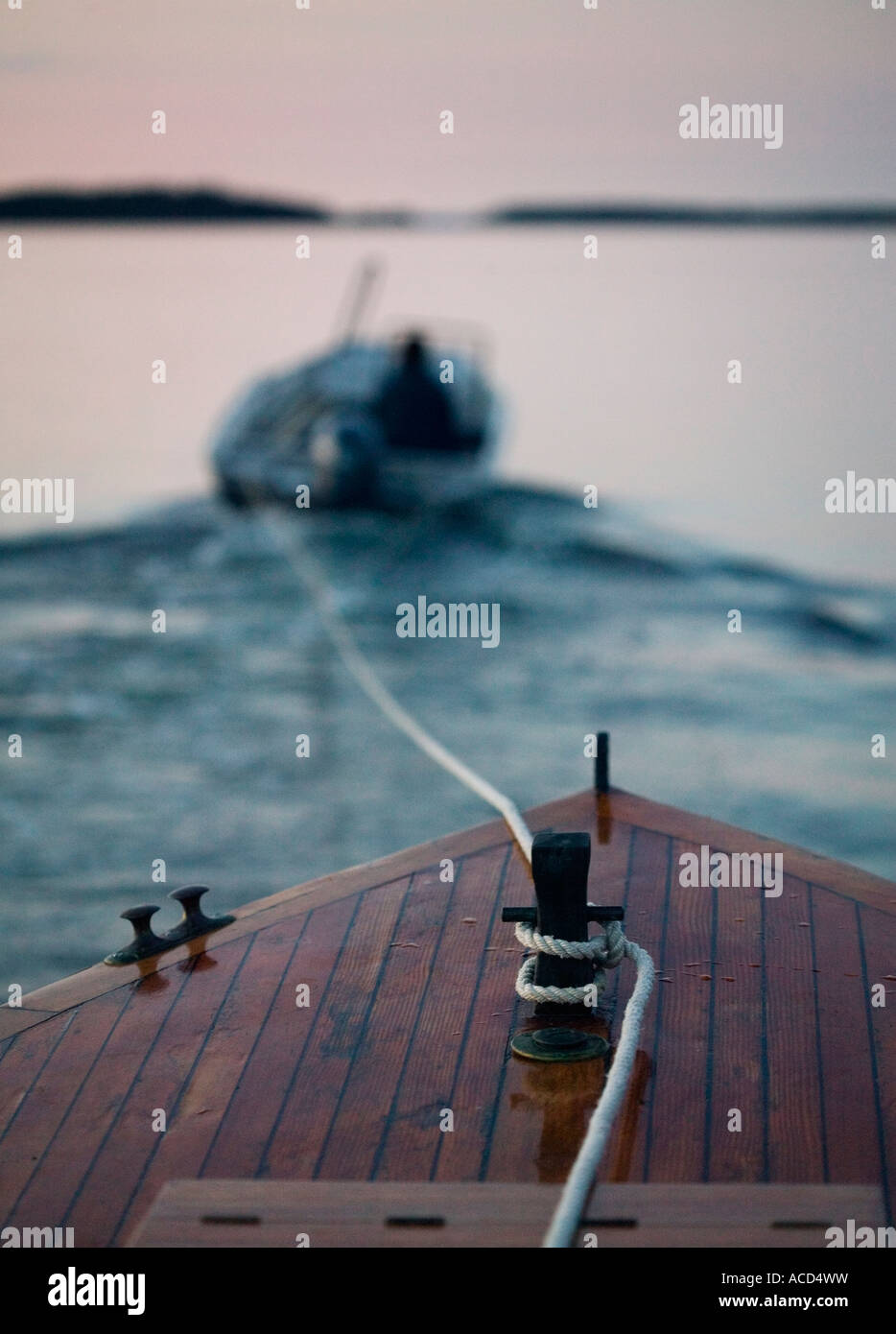 A boat being towed Stock Photo - Alamy