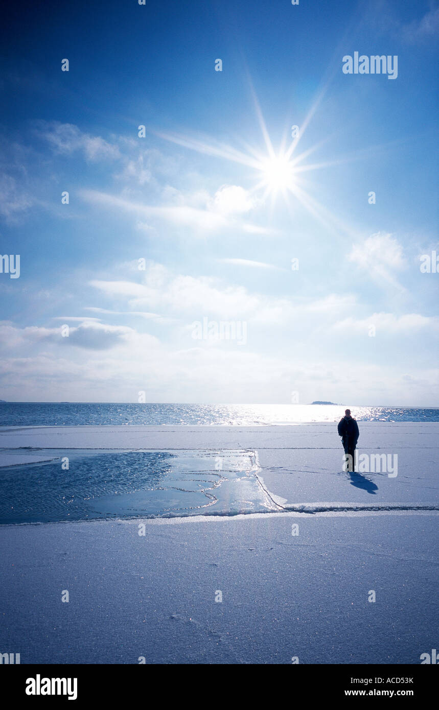 Silhouette of a person on the ice Stock Photo - Alamy