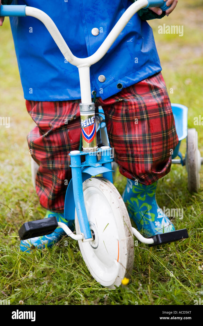 A child on a tricycle Stock Photo - Alamy