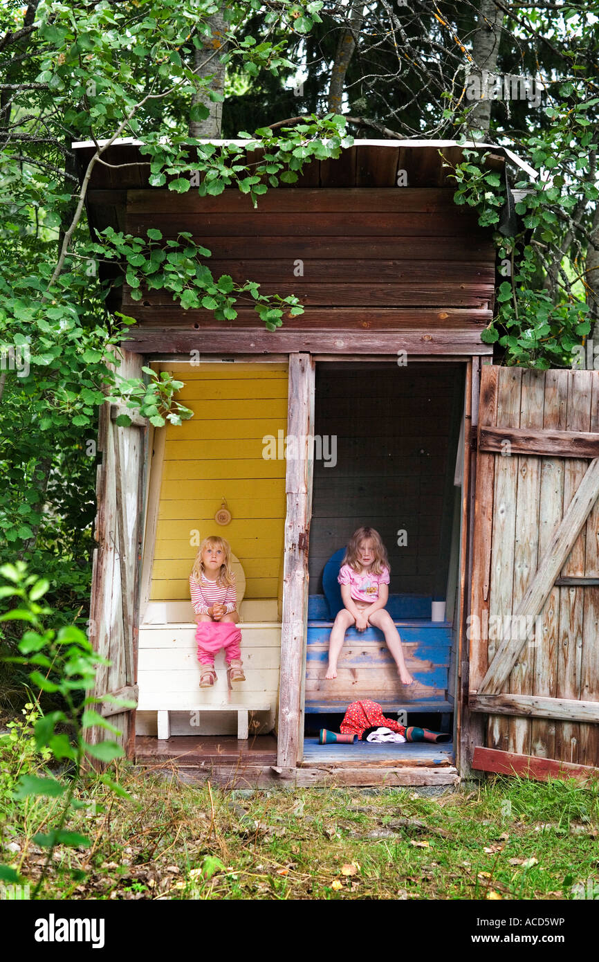 Two girls going to the loo next to eachother Sweden Stock Photo - Alamy