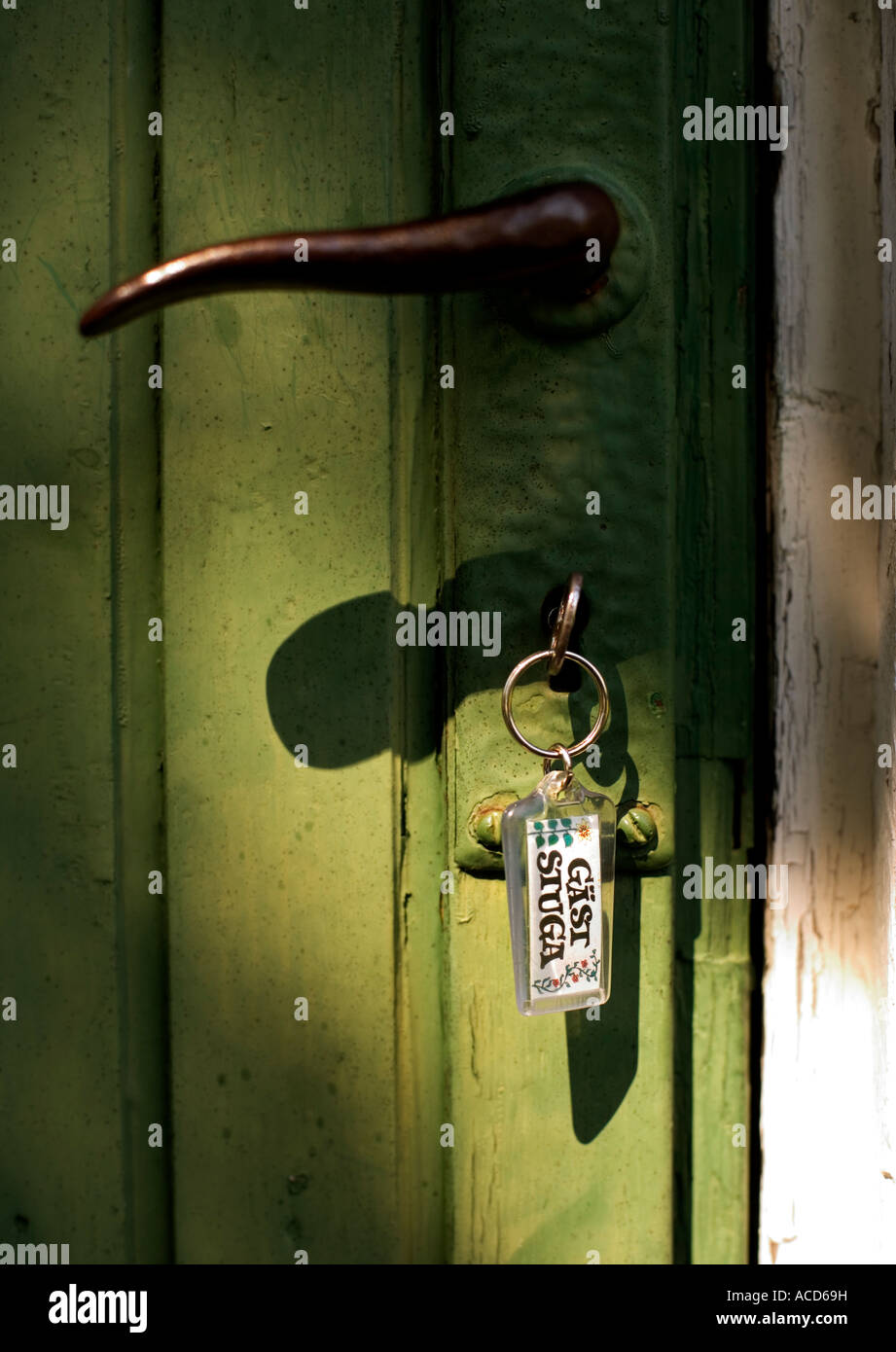 A door handle and a key Stock Photo - Alamy