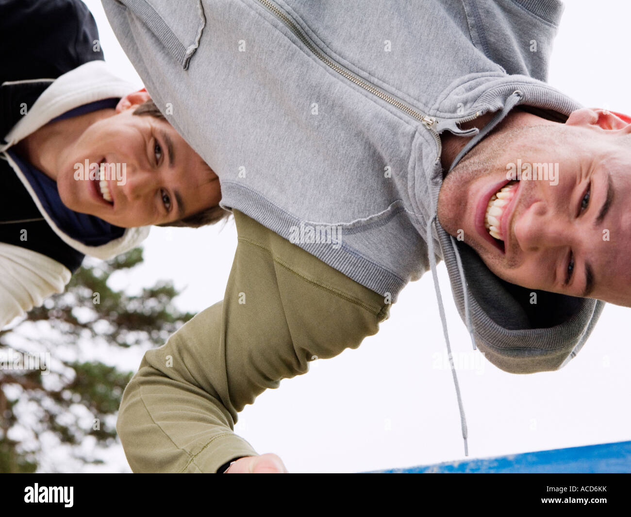 Two young men in an assault course Stock Photo - Alamy