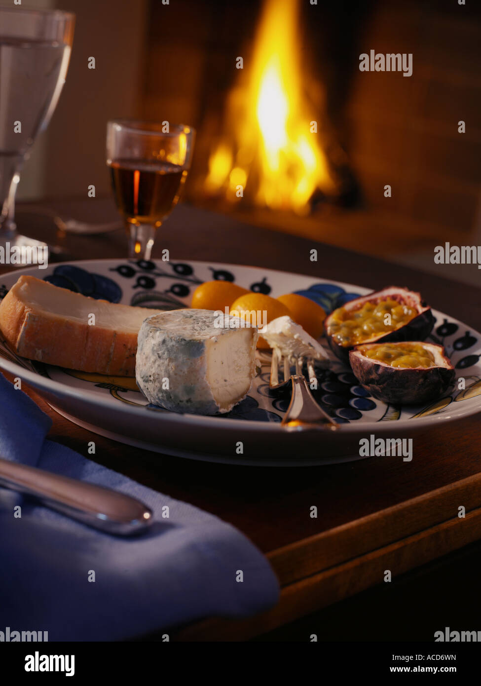Desert cheese by a fireplace Stock Photo - Alamy