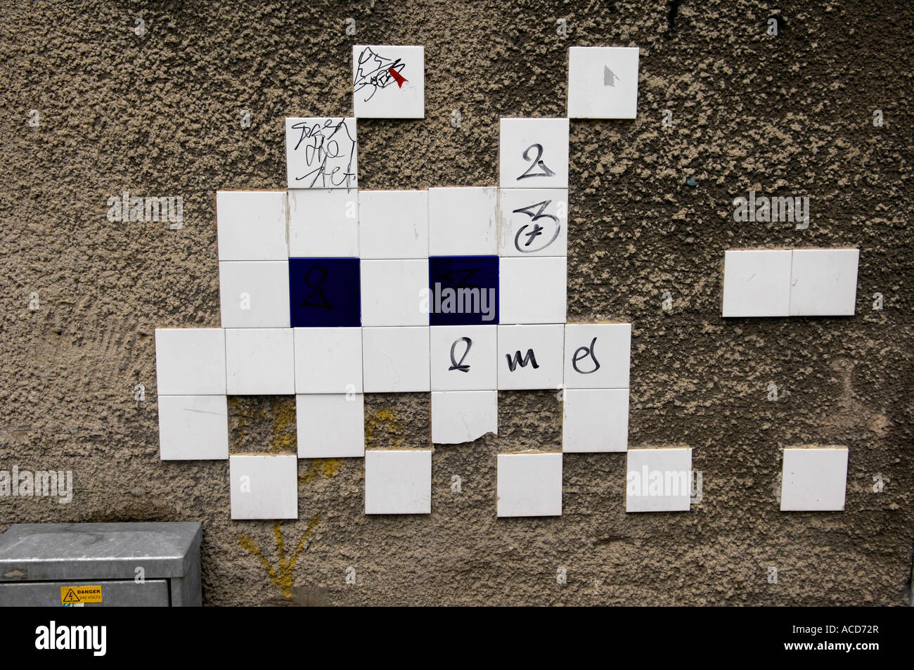 space invader tiles manchester Stock Photo - Alamy