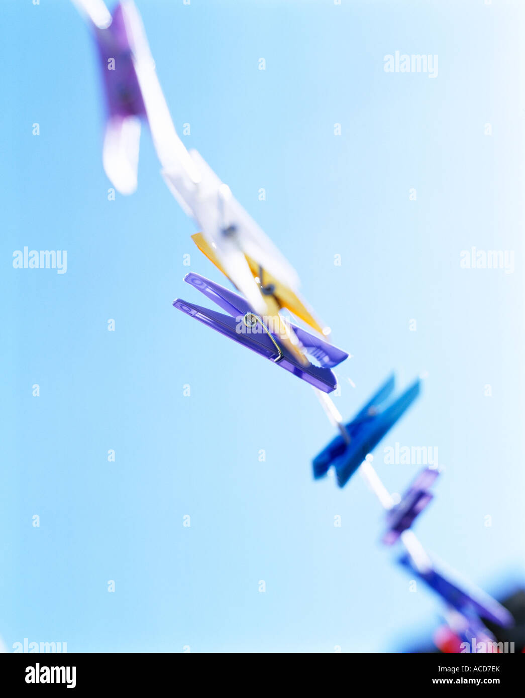 Clothespins on a clothes line Stock Photo - Alamy