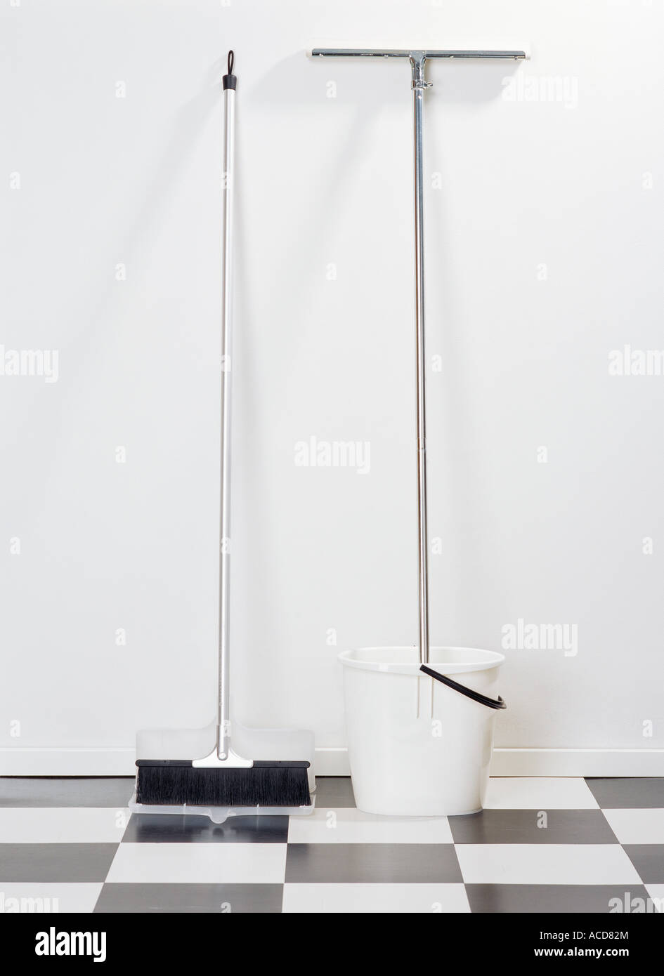 A broom and a bucket Stock Photo - Alamy
