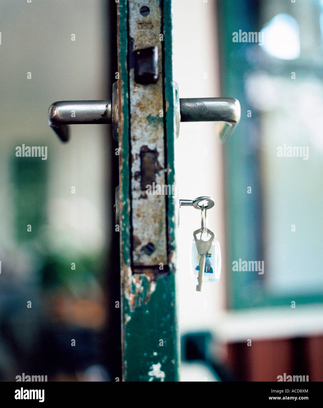 Keys in a door close-up Stock Photo - Alamy