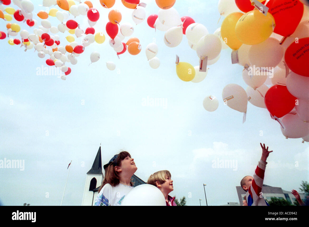 Balloon release children hi-res stock photography and images - Alamy