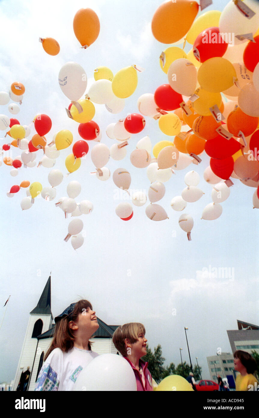 Children Launch Balloons Stock Photo - Alamy