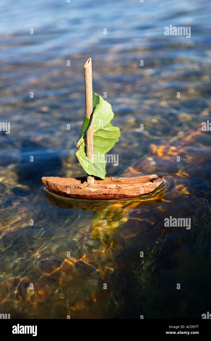 A bark boat on water Stock Photo - Alamy