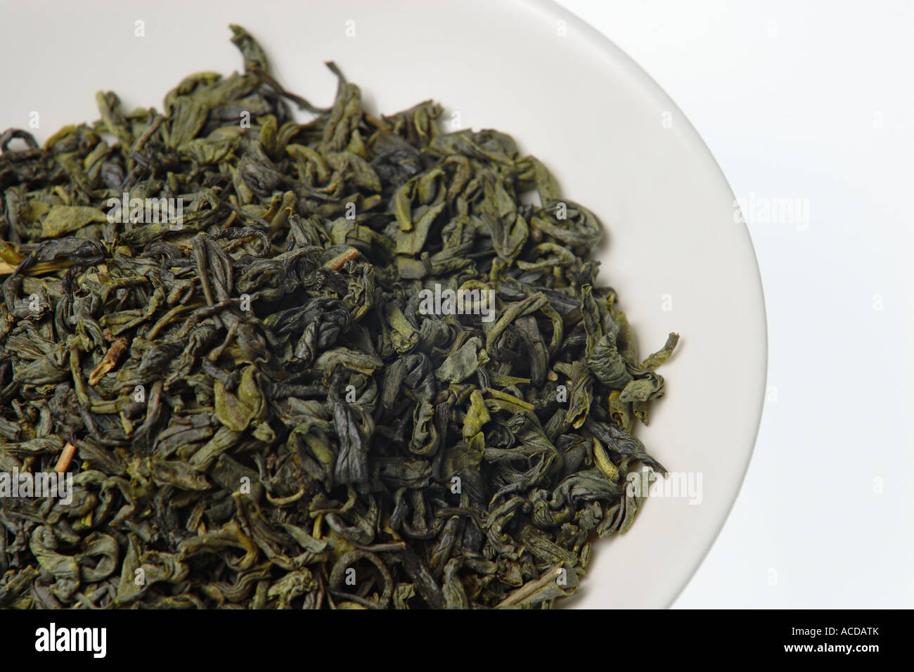 Green tea leaves plate Cut Out Stock Images & Pictures - Alamy
