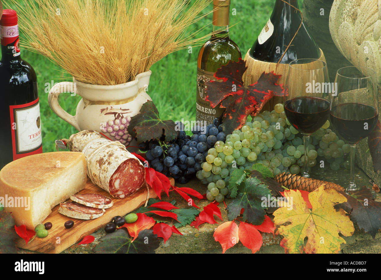 Wine grapes and foods of Chianti region of Tuscany in Italy Stock Photo ...
