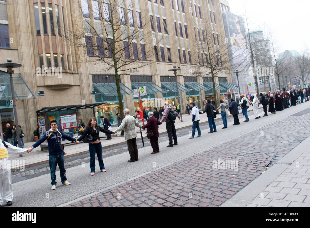 Human chain hi-res stock photography and images - Alamy
