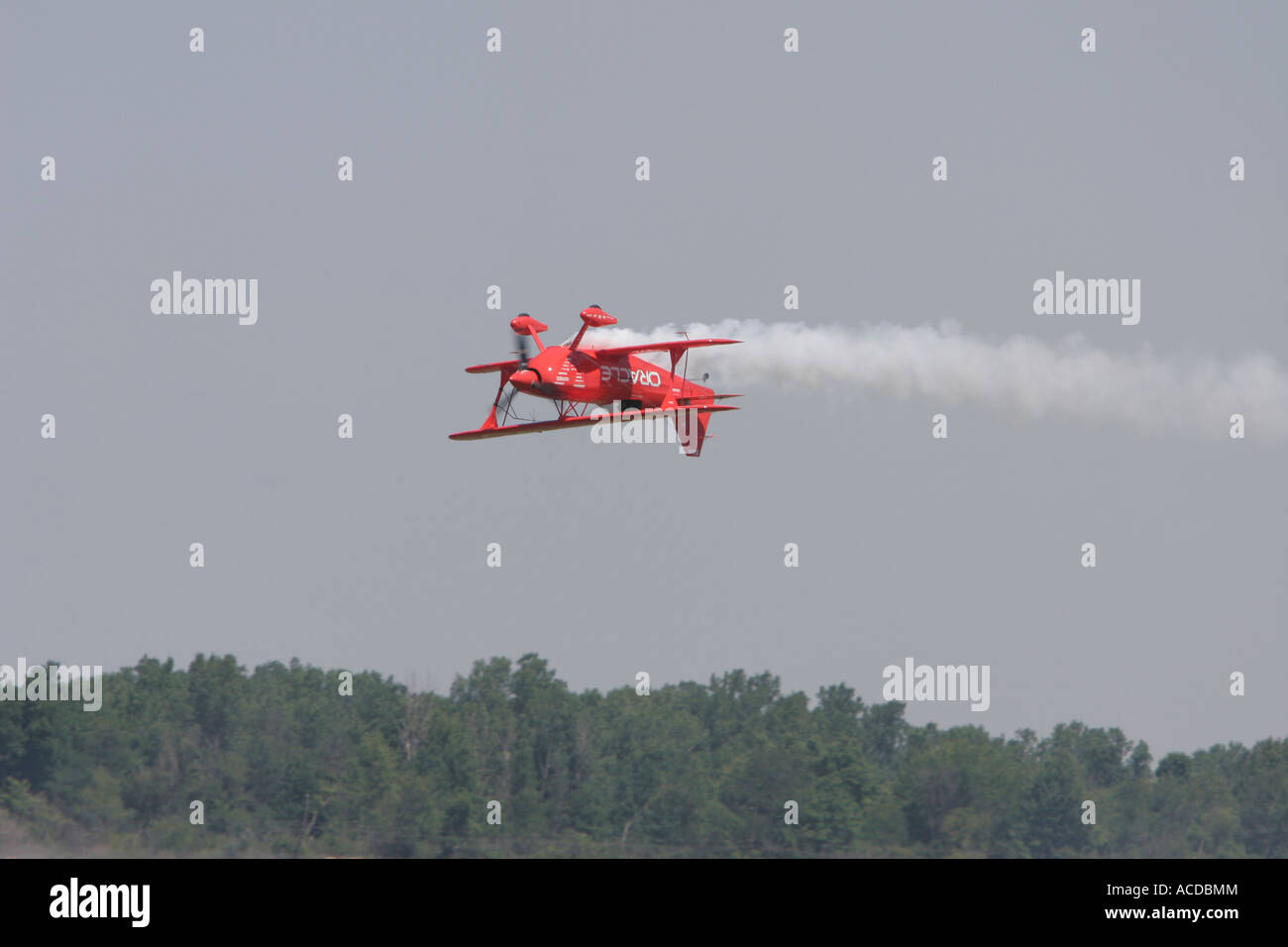 Oracle Challenger biplane performs aerobatics tricks at the air show ...