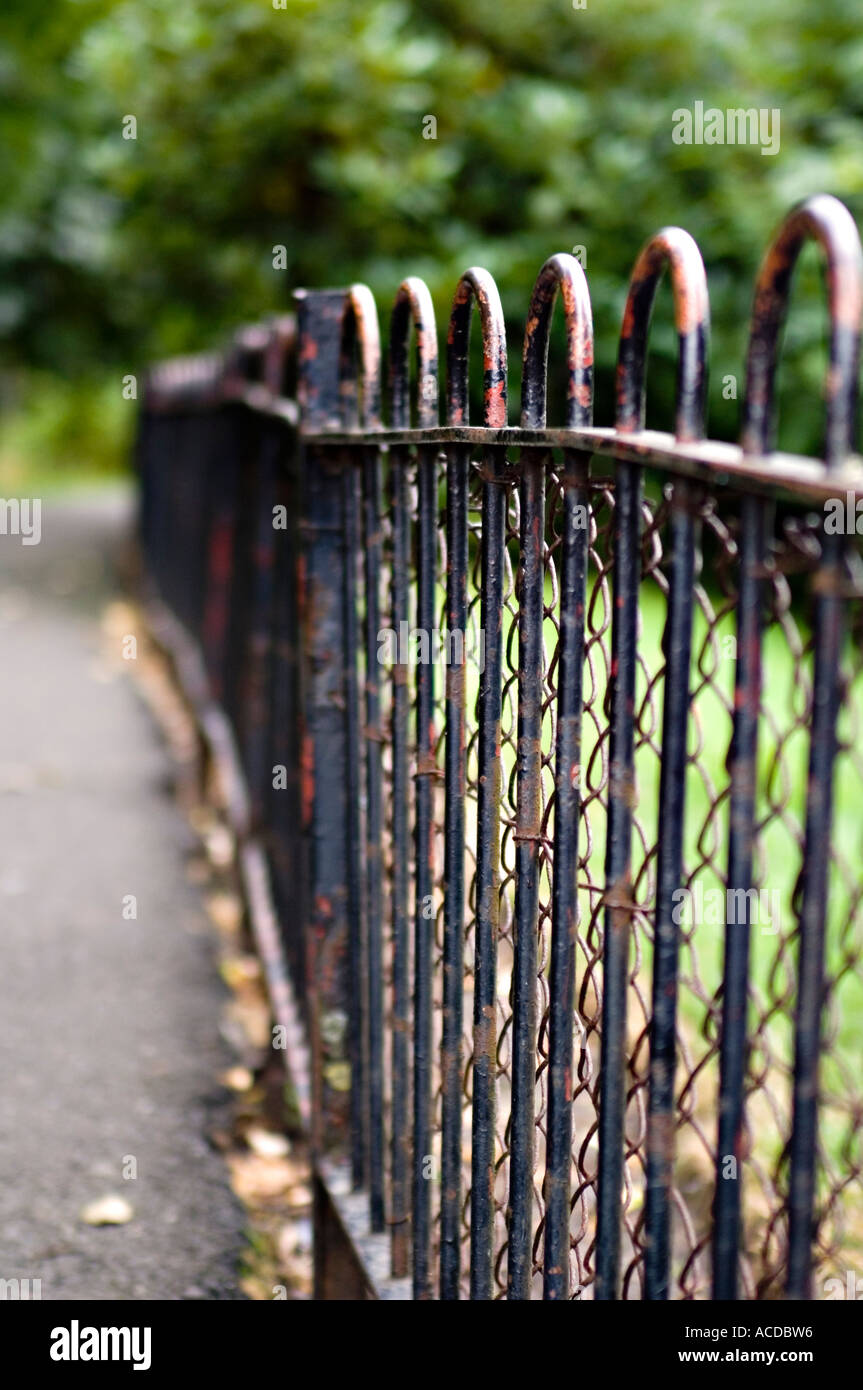 Railings by path in park Stock Photo - Alamy