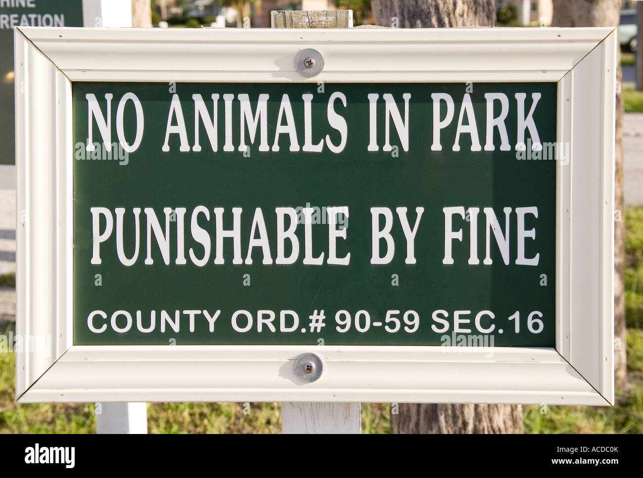No Animals in Park Punishable By Fine Sign USA Stock Photo - Alamy