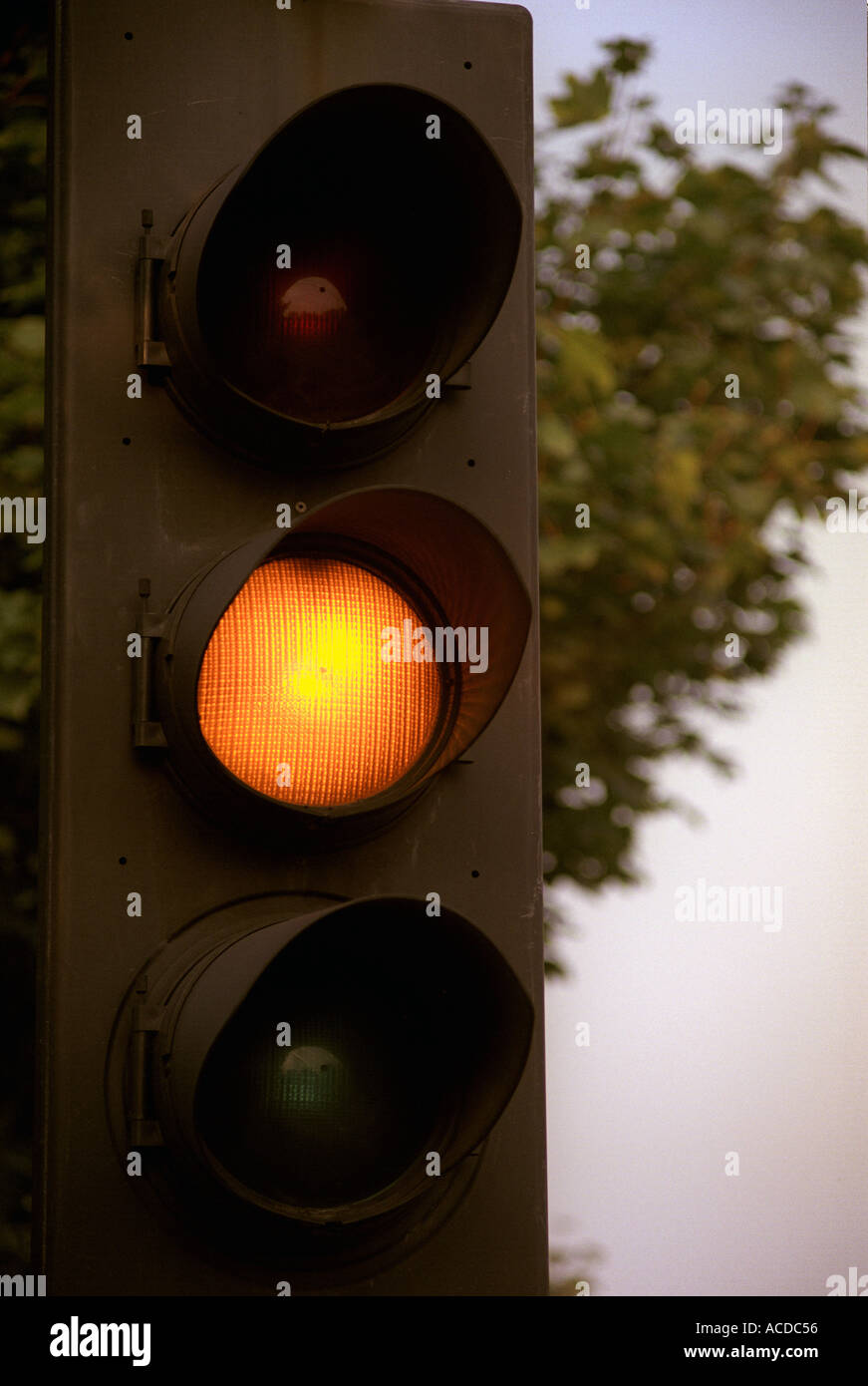 Orange traffic light Stock Photo - Alamy