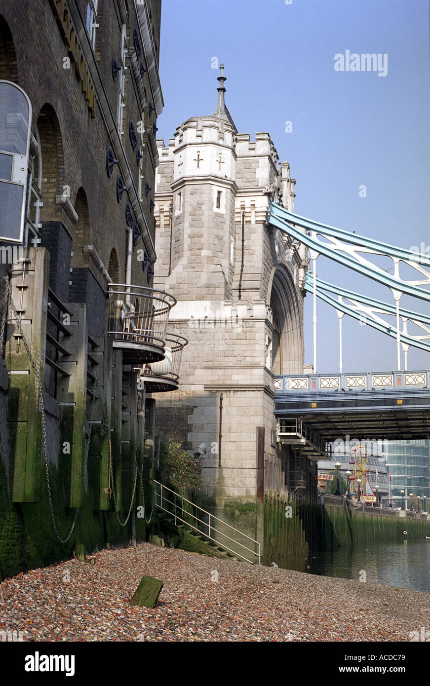 Shingle bank next to Tower bridge London England Stock Photo - Alamy